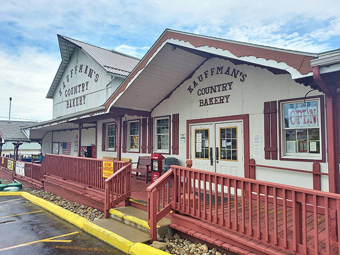 The iconic white facade with burgundy trim stands like a beacon of baked goodness. This isn't just a bakery&mdash;it's a destination worth the detour.