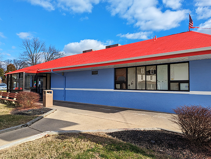 The blue-and-red exterior stands like a culinary lighthouse in Wilmington, promising comfort and satisfaction with its no-nonsense diner charm.