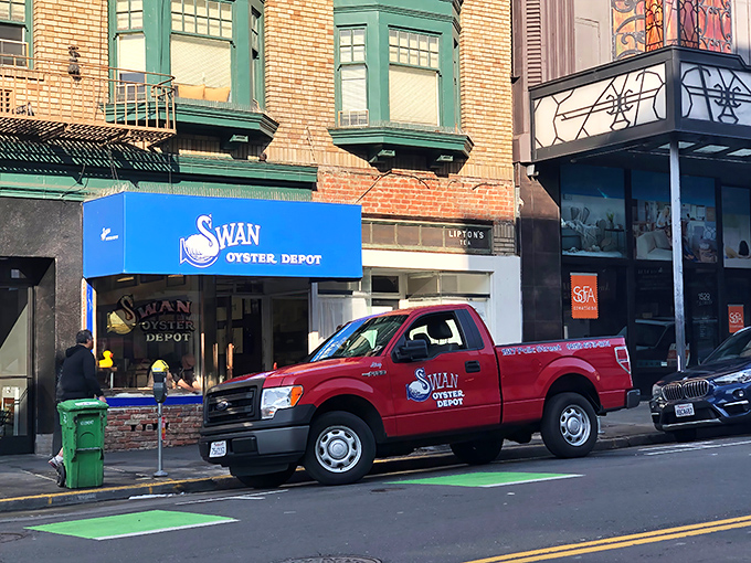 The iconic blue awning of Swan Oyster Depot &ndash; San Francisco's seafood institution where time stands deliciously still on Polk Street.