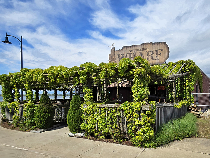 Mother Nature's favorite restaurant? This vine-covered waterfront gem looks like it was decorated by the world's most talented gardener.