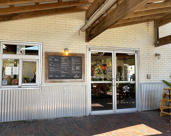 The unassuming exterior of Timoti's belies the seafood treasures within. Cream brick, corrugated metal, and wooden beams create that perfect "we found a local gem" vibe.