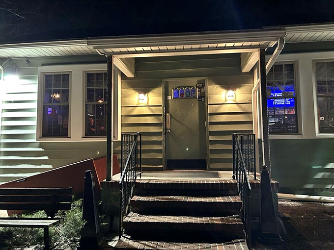 The unassuming exterior of The Pines Tavern proves once again that culinary treasures often hide in plain sight, nestled under mature trees on a quiet Bristol street.