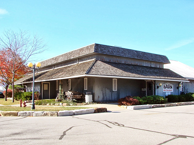 The architectural equivalent of comfort food &ndash; this weathered wooden exterior promises authentic Midwestern hospitality before you even reach the door.