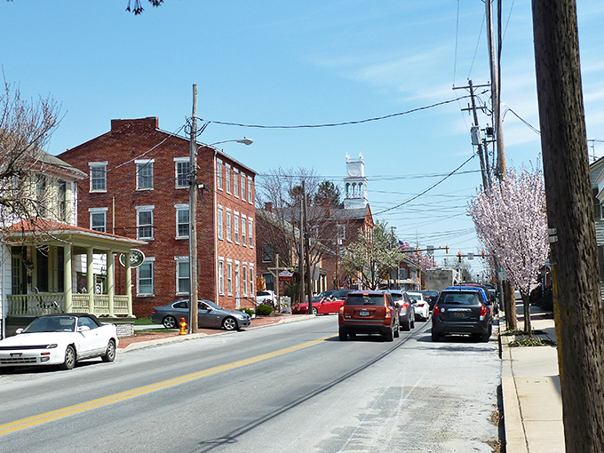 Historic brick buildings line Strasburg's Main Street, where time seems to slow down just enough to let you appreciate architecture that's witnessed centuries of American life.