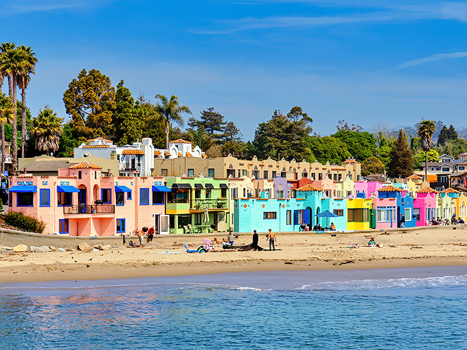 The Venetian Court's candy-colored cottages create California's answer to Portofino, their reflections doubling the visual feast along Capitola's shoreline.