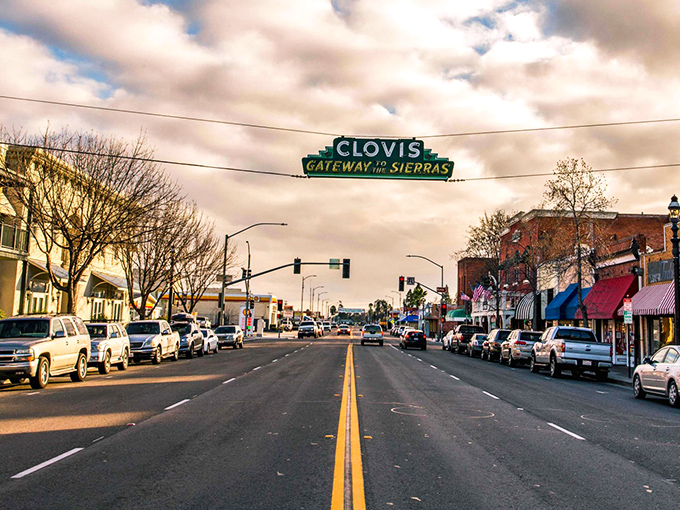The iconic "Gateway to the Sierras" sign welcomes you to Clovis, where small-town charm meets California sunshine without the coastal price tag.