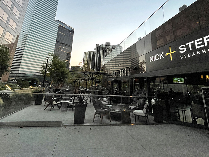 The sleek exterior of Nick and Stef's promises what lies within—a temple of beef where downtown LA's skyline serves as the perfect backdrop for meat-based worship.