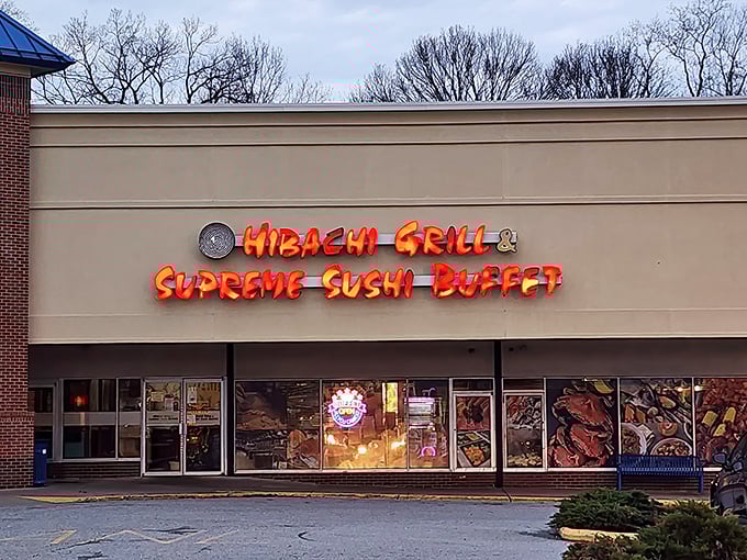 The bright red signage of Hibachi Grill & Supreme Sushi Buffet beckons like a lighthouse for the hungry, promising an all-you-can-eat adventure in Wilmington's shopping district.