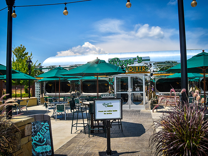 The outdoor patio at Roger's Diner feels like summer vacation incarnate &ndash; complete with string lights that promise evening magic under North Carolina skies.