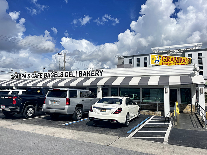 The iconic black and white awning of Grampa's stands like a beacon of breakfast hope on South Federal Highway, promising carb-laden bliss within.