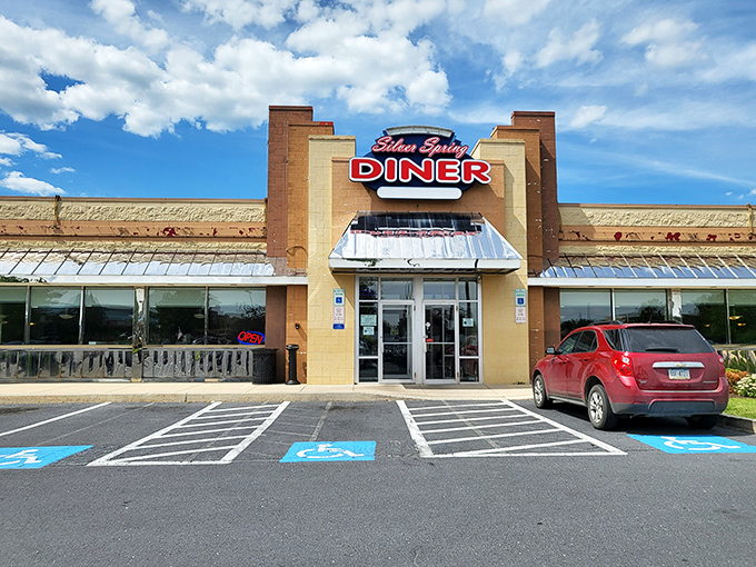 The classic neon sign beckons like an old friend. Silver Spring Diner's tan brick exterior promises comfort food that actually delivers on the comfort part.