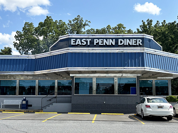 That classic blue and white diner exterior promises the kind of breakfast magic your grandmother would approve of.