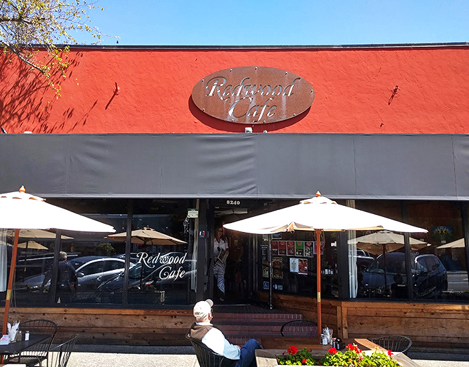 The vibrant red exterior of Redwood Cafe stands out like a culinary beacon in Cotati, promising comfort food worth the journey.