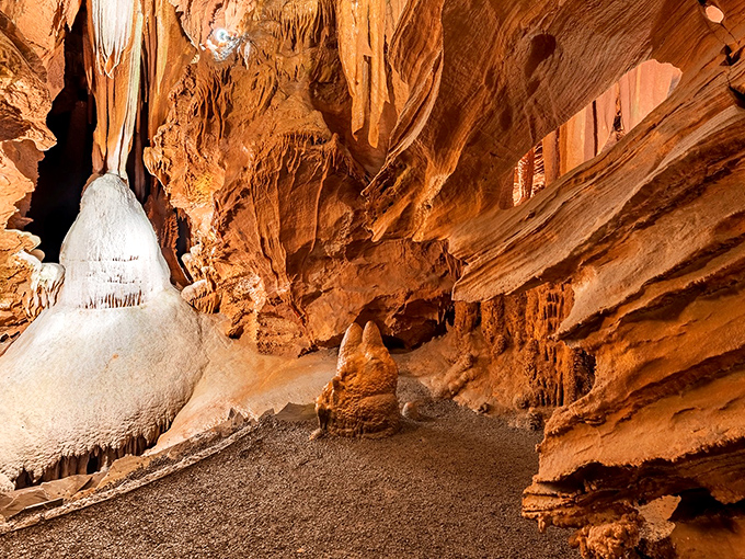 Nature's own sculpture gallery, where millions of years of dripping water created this otherworldly landscape of amber-hued formations.