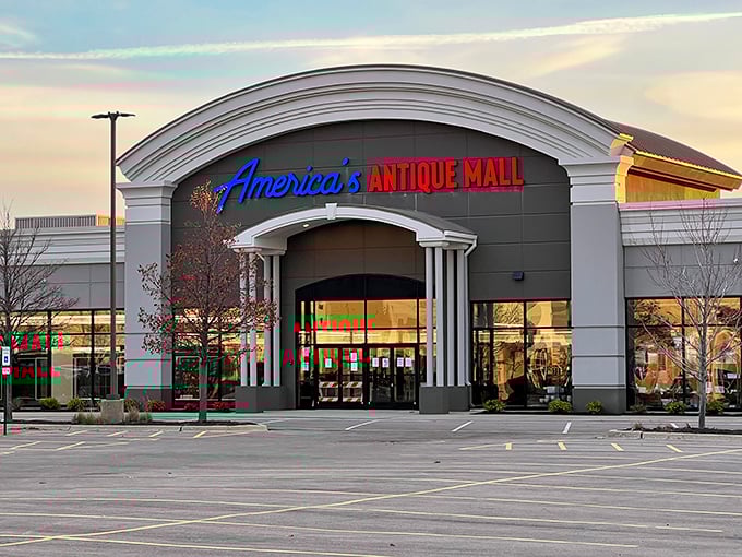 The grand entrance to America's Antique Mall beckons with retro charm and the promise of treasures waiting just beyond those glass doors.
