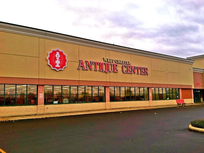 The unassuming exterior of West Chester Antique Center belies the wonderland of nostalgia waiting inside. Like a time machine disguised as a strip mall tenant.