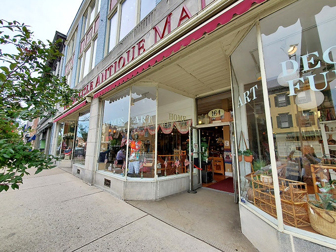 The iconic red awning of Carlisle Antique Mall beckons treasure hunters like a vintage siren song, promising discoveries that IKEA simply can't replicate.