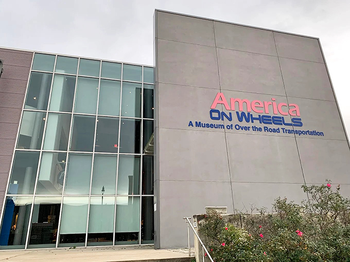 The sleek modern exterior of America On Wheels stands like a temple to transportation history, its glass fa&ccedil;ade reflecting Allentown's industrial heritage and automotive future.