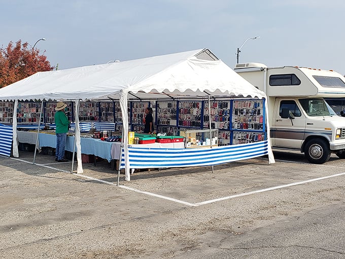 A shopper's paradise under canvas&mdash;where treasures await beneath blue-striped tents and California sunshine, proving one person's past is another's perfect find.