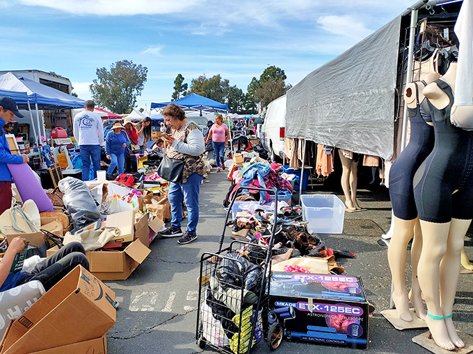 Welcome to treasure hunter paradise! Colorful canopies shelter an asphalt wonderland where one person's castoffs become another's prized discoveries.