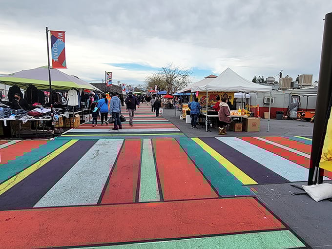 Treasure hunters navigate the bustling aisles of San Fernando Swap Meet, where colorful toys and clothing create a retail wonderland that makes mall shopping seem downright boring.
