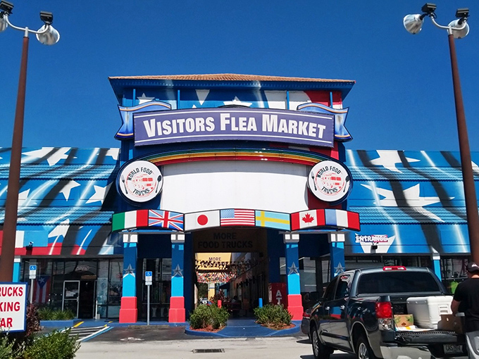 The patriotic blue facade of Visitors Flea Market stands out like a beacon for bargain hunters on Highway 192. Stars, stripes, and shopping paradise! 