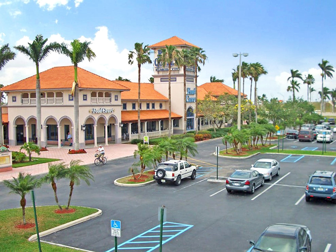 Mediterranean meets Florida at this coral-roofed shopping paradise. Palm trees stand guard as shoppers embark on their bargain-hunting adventures.
