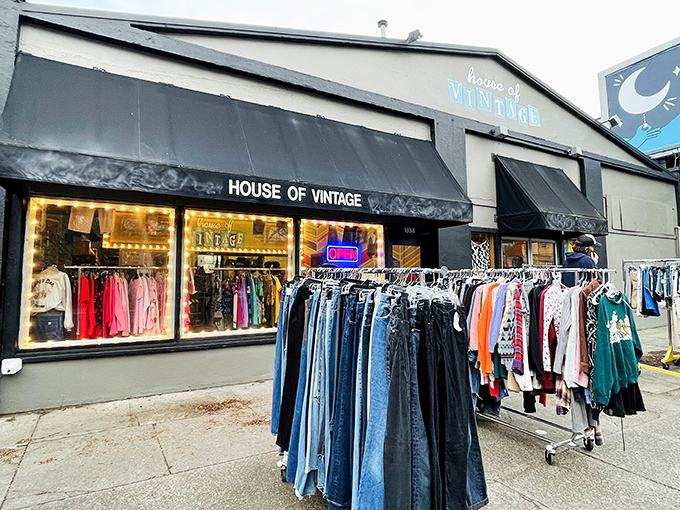 The unassuming exterior of House of Vintage belies the technicolor time machine waiting inside. Clothing racks spill onto the sidewalk like appetizers before the main course.