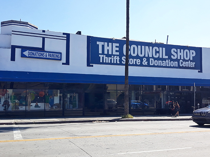 The neon-lit storefront of The Council Shop beckons like a lighthouse for bargain hunters, its green and white sign promising treasures within.