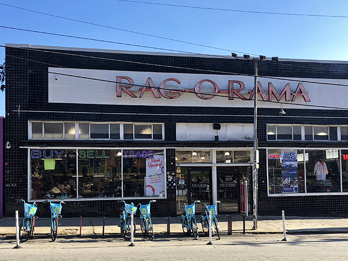 The iconic black-tiled facade of Rag-O-Rama stands as a beacon for fashion treasure hunters in Atlanta's eclectic Little Five Points neighborhood.