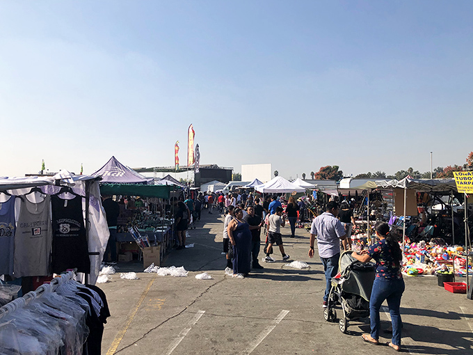 Families stroll through the bustling aisles of Paramount Swap Meet, where every turn promises a new discovery and potential bargain.
