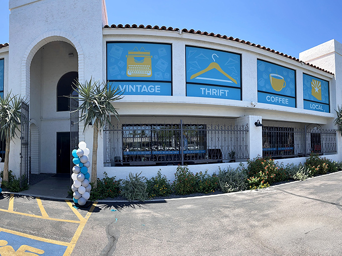 The Spanish-style exterior with its vibrant blue window panels promises treasures inside &ndash; like a stylish friend who always delivers on their promises.