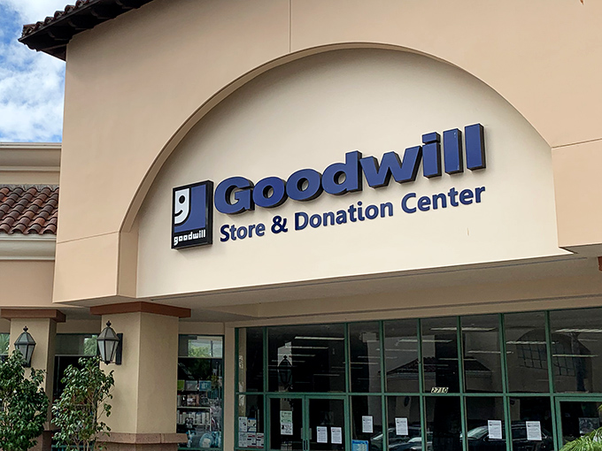 The Spanish-style fa&ccedil;ade of Ventura's Goodwill welcomes treasure hunters with palm-fringed promise and that iconic blue smile logo.