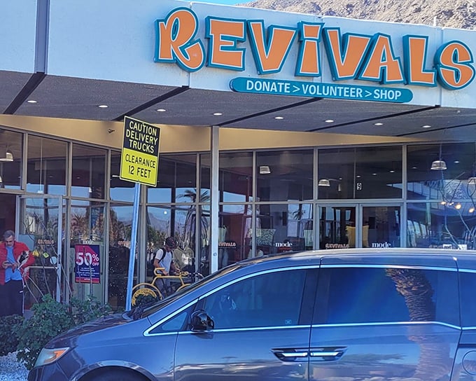 Revival's bold blue and orange signage stands out against the desert backdrop like a mid-century modern oasis promising treasure within.