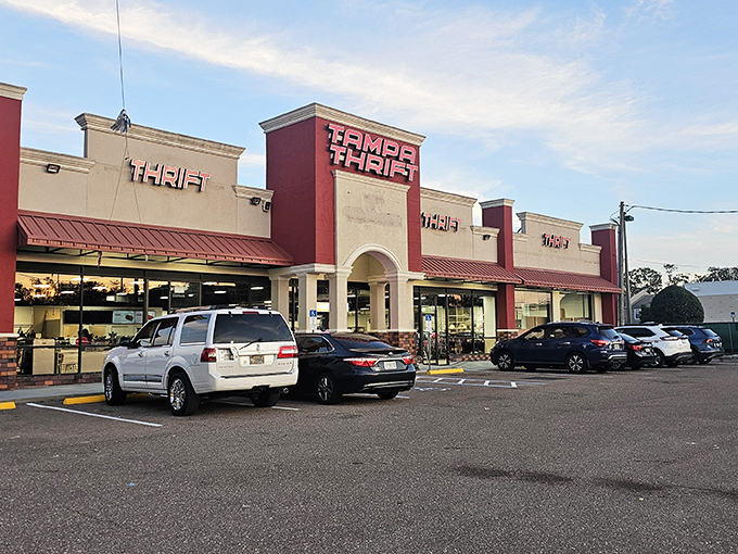 The red-and-cream exterior of Tampa Thrift beckons like a fashion oasis in the Florida sun. Treasure hunters, your destination awaits!