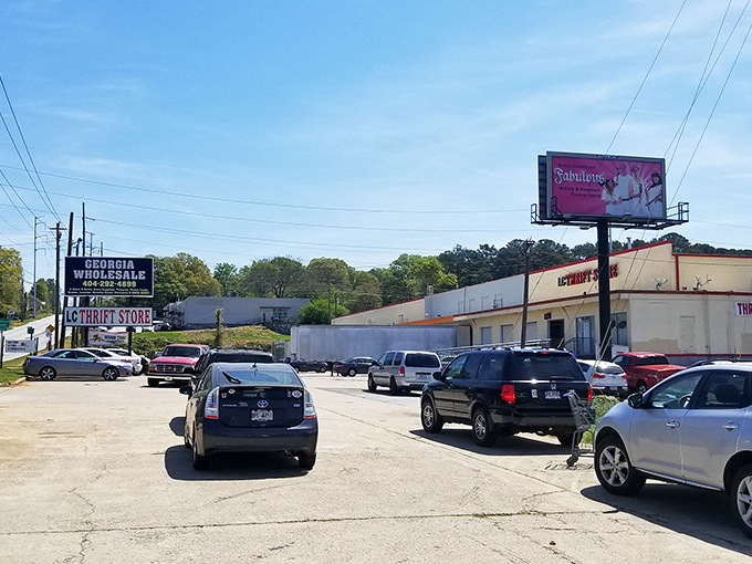 The unassuming exterior of LC Thrift Store &ndash; where treasures hide behind cream walls and red lettering. Retail archaeology at its finest! 