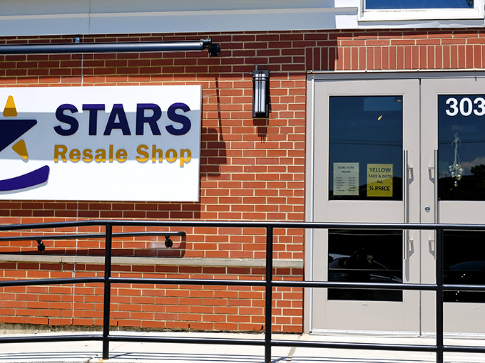 The unassuming brick exterior of Stars Resale Shop hides a treasure trove within. Budget fashion awaits behind those humble doors.