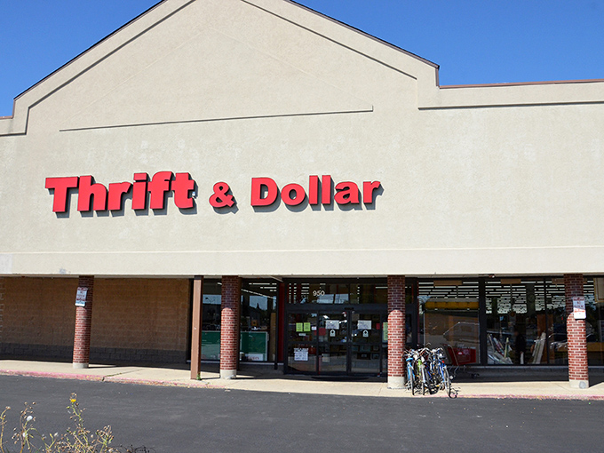 The red lettering of Thrift & Dollar beckons like a siren call to bargain hunters across Aurora. Treasure awaits inside!