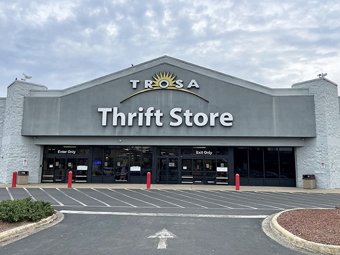 The TROSA Thrift Store stands like a cathedral of second chances, its bright sign beckoning bargain-hunters from across North Carolina.