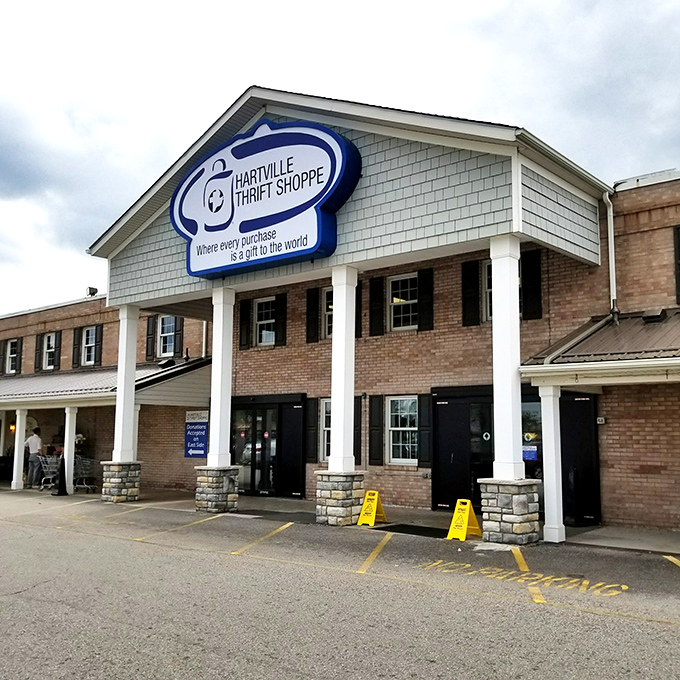The stately brick exterior of Hartville Thrift Shoppe gives no hint of the treasure trove waiting inside—it's like Fort Knox for bargain hunters.