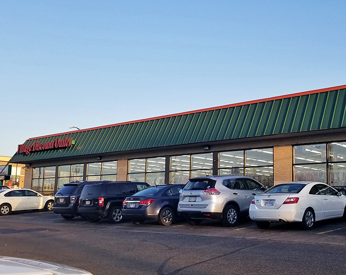 The unassuming exterior of Village Discount Outlet belies the treasure trove within. Like a bargain hunter's Narnia, this green-roofed wonderland awaits.
