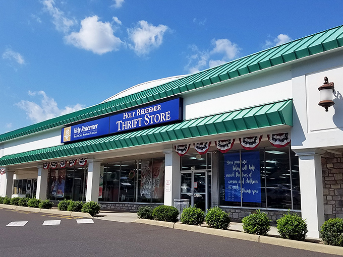 The storefront beckons with its distinctive green-trimmed roof and bold blue signage &ndash; like a beacon for bargain hunters with discerning taste.