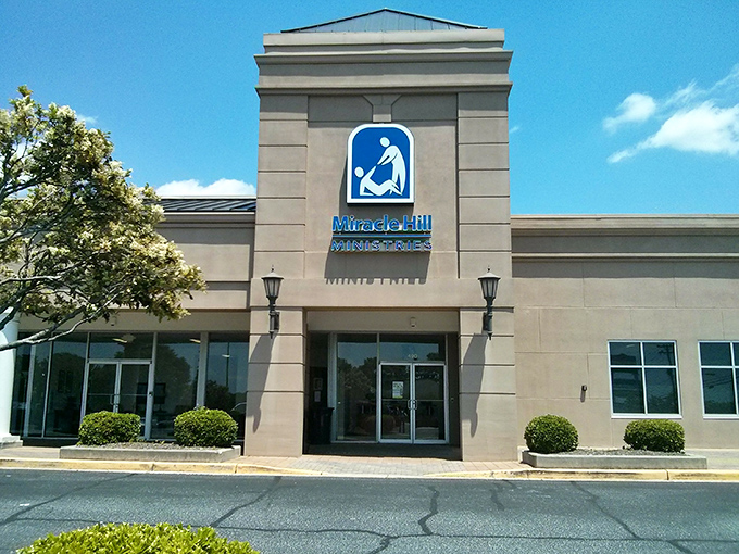 The blue lettering beckons like a siren song to bargain hunters. This isn't just a thrift store—it's a treasure-hunting expedition waiting to happen.