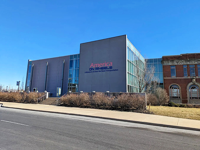 The sleek modern exterior of America On Wheels stands like a temple to transportation history, its glass fa&ccedil;ade reflecting Allentown's industrial heritage and automotive future.