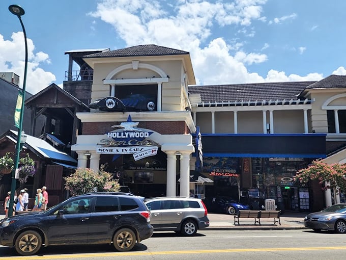 The Hollywood Star Cars Museum stands proudly on Gatlinburg's bustling Parkway, beckoning movie buffs and gearheads alike with its iconic signage and promise of automotive stardom.