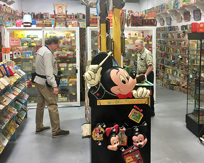 Mickey Mouse stands guard at the entrance to this wonderland of nostalgia, where lunch boxes become time machines to childhood memories.