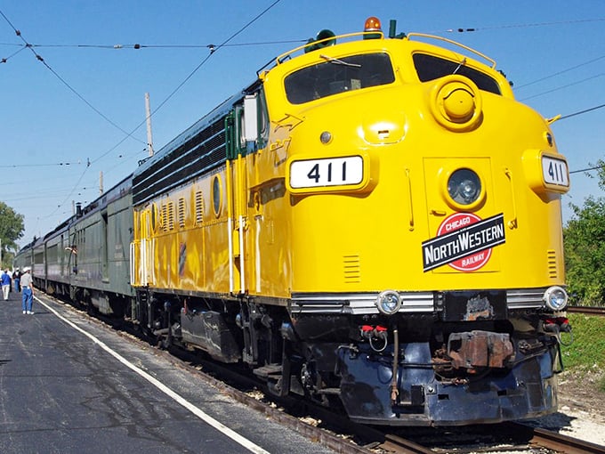 The gleaming yellow Northwestern locomotive #411 stands ready for adventure, like a 200-ton time machine waiting to whisk you back to railroading's golden age.