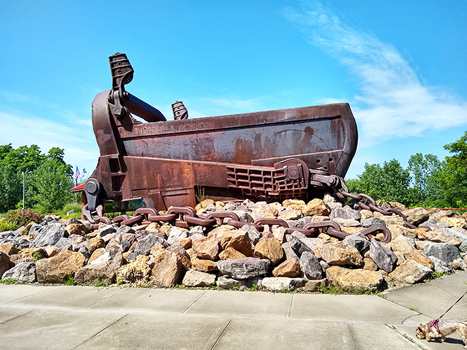 The rusting giant sits like a prehistoric creature taking a break from earth-moving duties. Industrial history never looked so impressively massive.