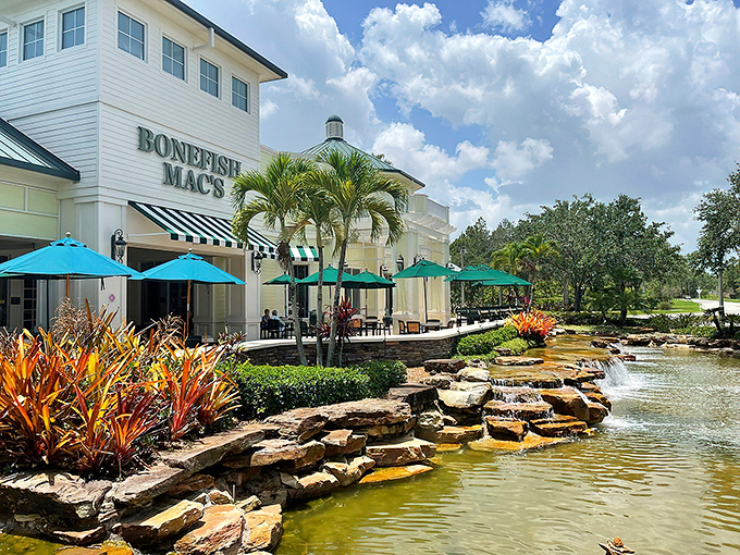 Waterfront dining that doesn't require a yacht club membership. Bonefish Mac's coastal charm welcomes you with turquoise umbrellas and a serene water feature.