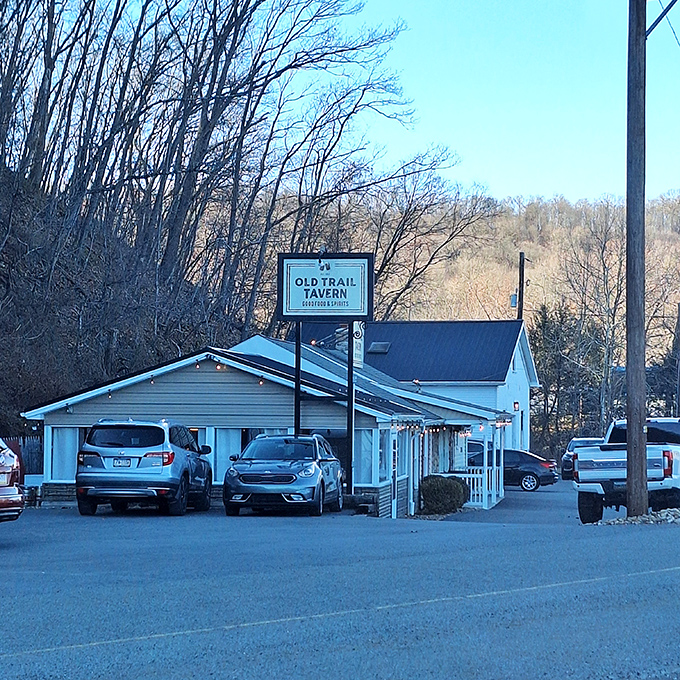 The unassuming exterior of Old Trail Tavern + Steak stands like a culinary lighthouse against the Pennsylvania hills, promising comfort and satisfaction to weary travelers.